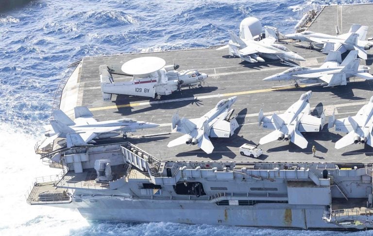In pictures: US Navy aircraft carrier damaged after collision - Naval ...