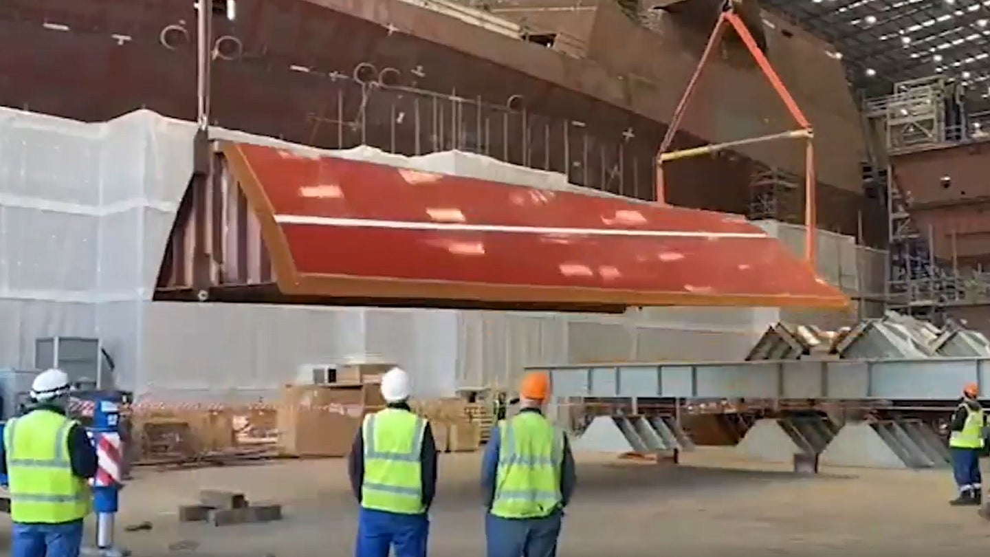 Build of HMS Active sees lift and turn of final double bottom section ...